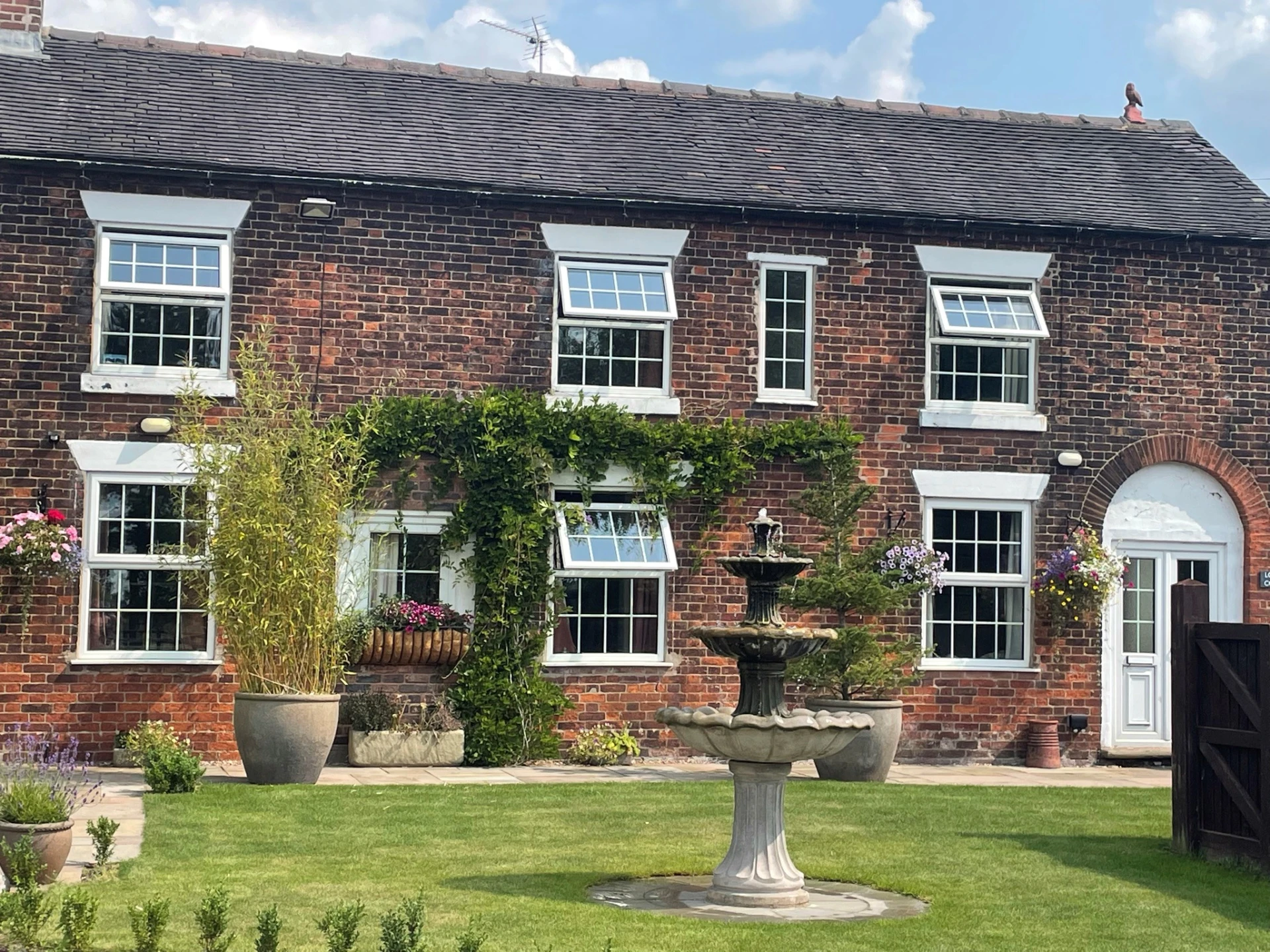 A charming four-bedroom detached period cottage, beautifully positioned ...